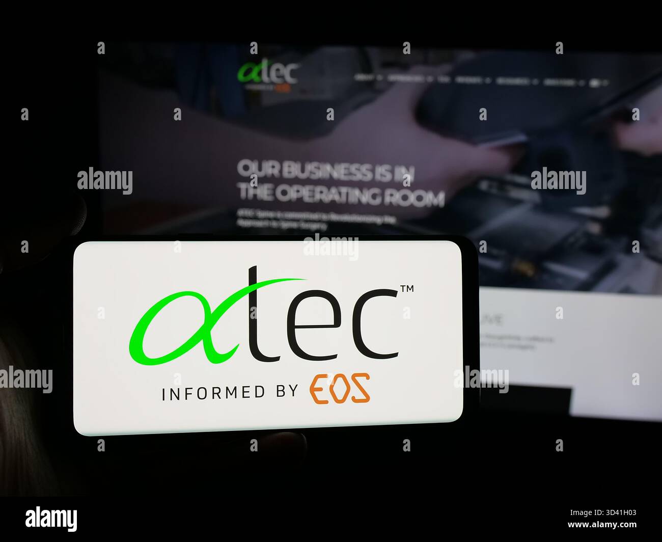 In this photo illustration, a person is holding a smartphone with the ...