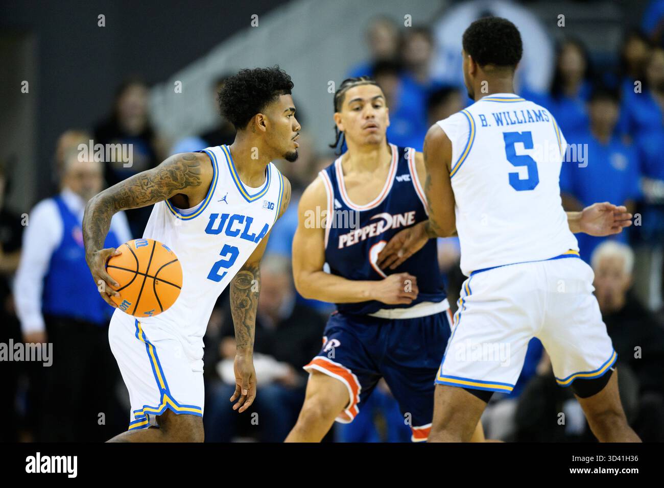 UCLA guard Donovan Dent (2) controls the ball during the first half of ...