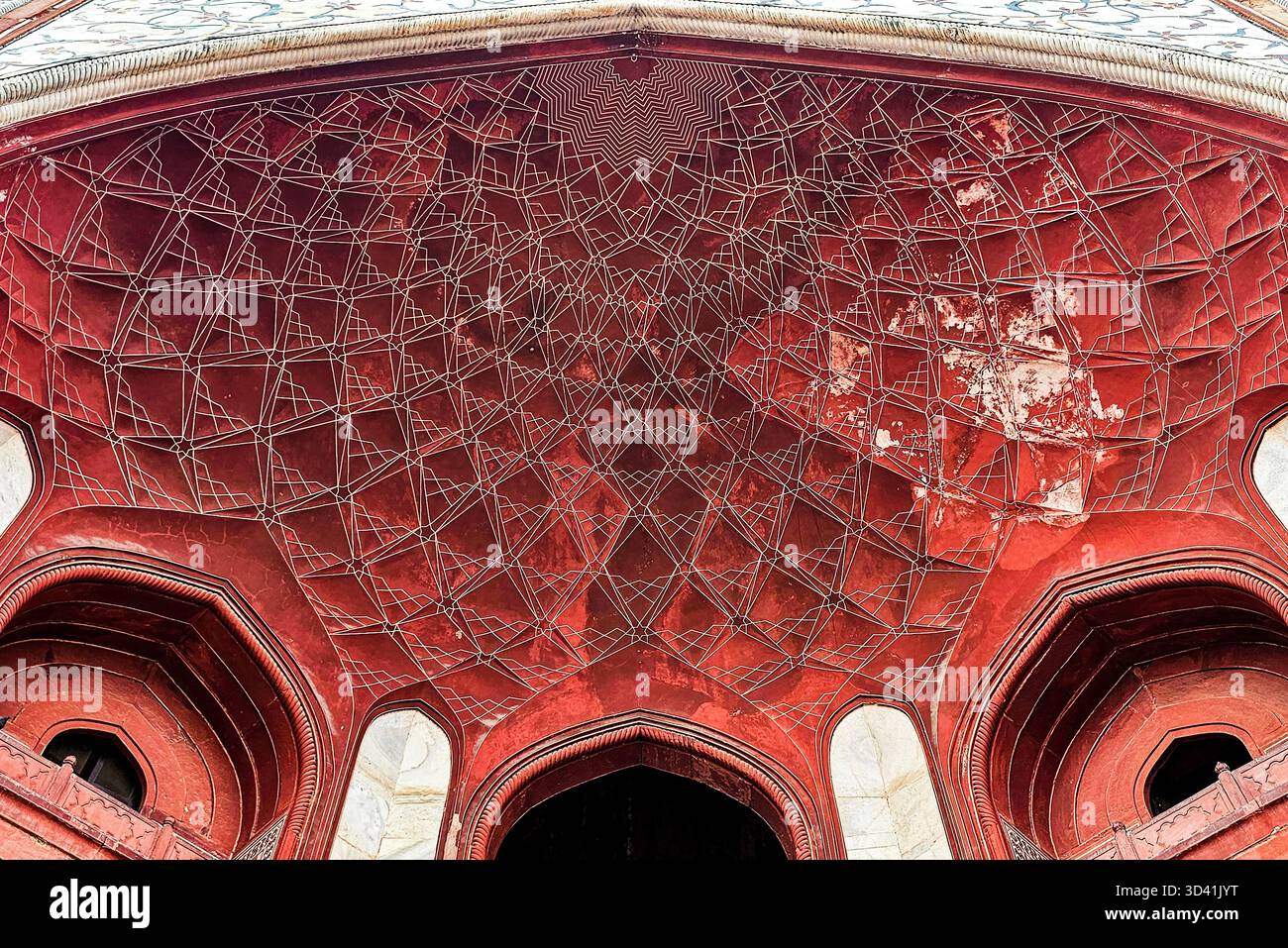 Intricate Red Ceiling With Geometric Lattice And Archway Details In ...
