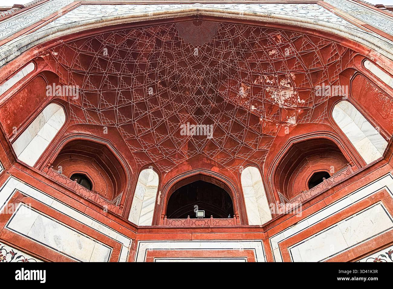 Intricate Red Ceiling With Geometric Lattice And Archway Details In ...
