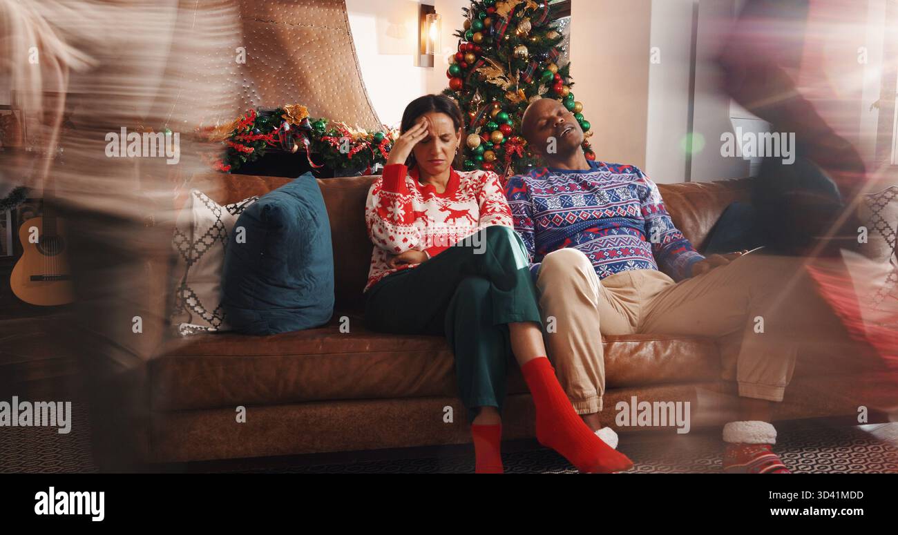 Christmas, home and couple with stress, tired and exhausted with ...
