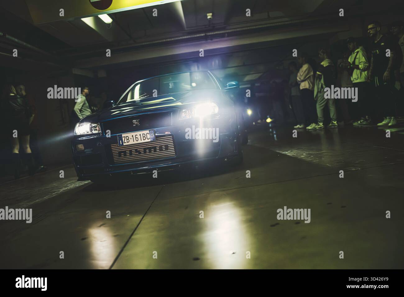 Milan, italy 28 october 2025: blue nissan skyline gt-r r34 with ...