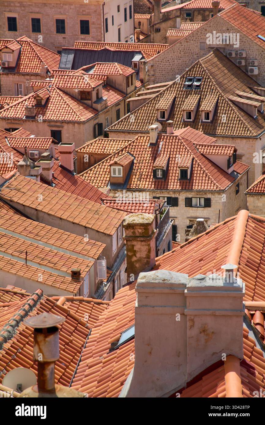 A high-angle vertical view of the densely packed terracotta rooftops in ...