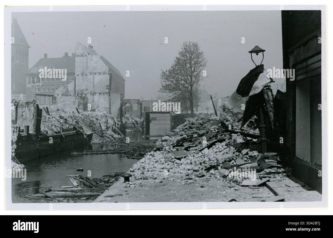 This view shows the rubble along the Delftsevaart quay after the German ...