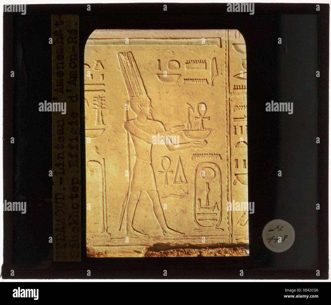 A close-up image of Amon-Re in low relief on the lintel of Amenemhat ...