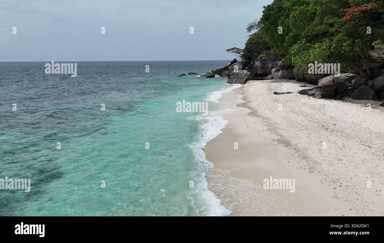 Peaceful beach featuring soft hi-res stock photography and images - Alamy