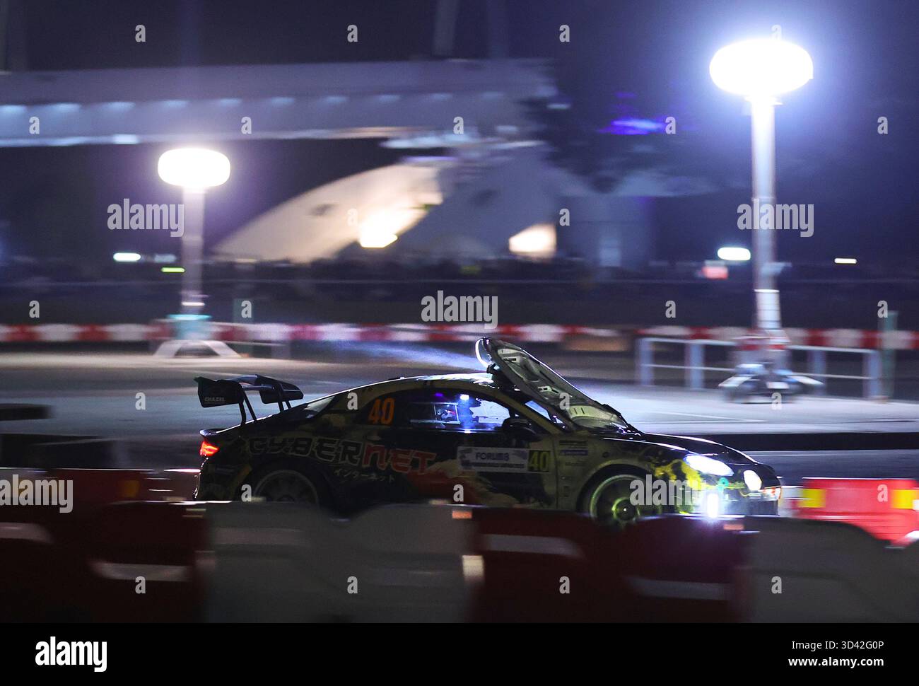 Correction: A car drives while a bonnet remaining open on the course of ...