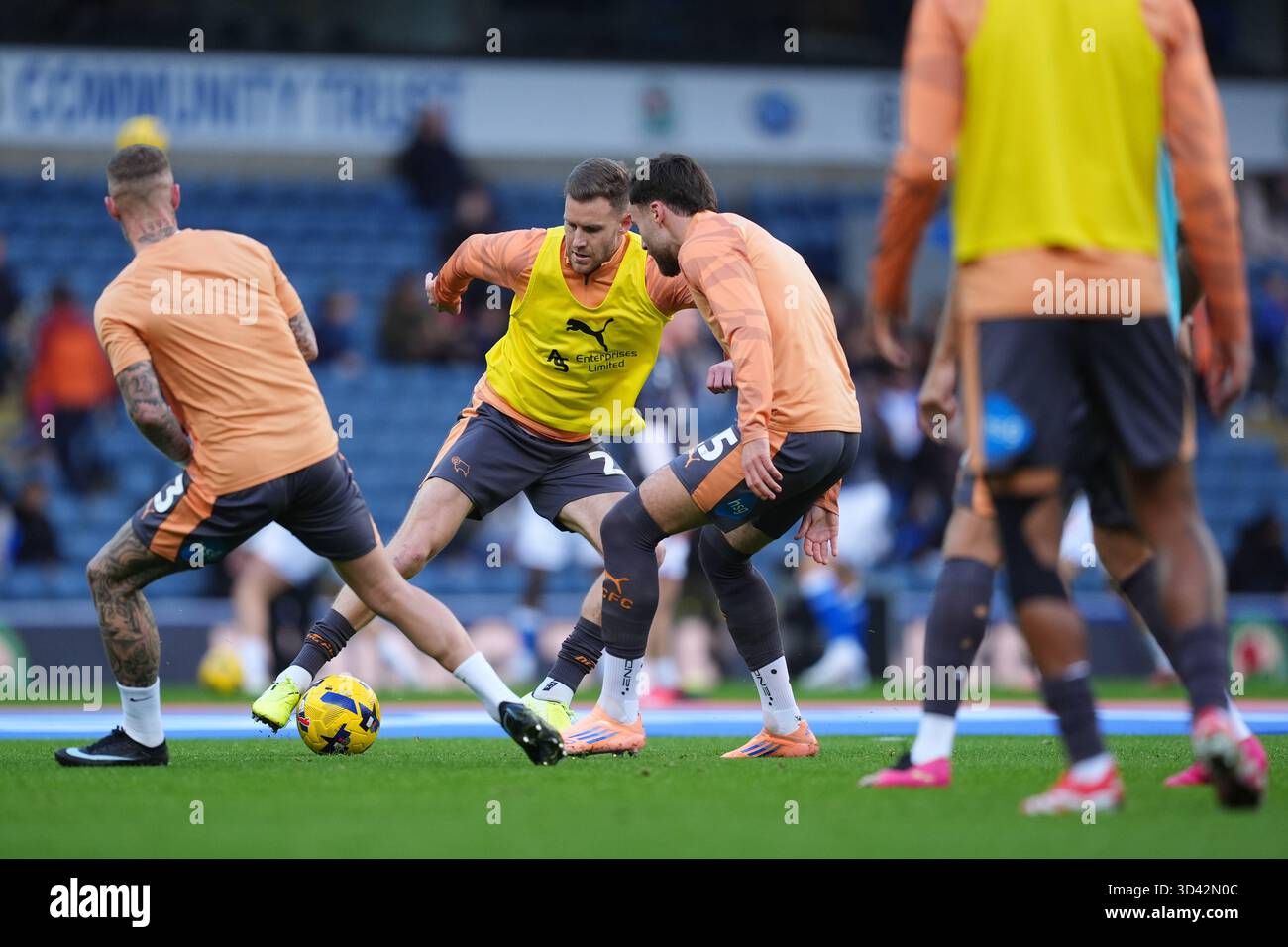 Derby County's Callum Elder (centre) warms up during the Sky Bet ...