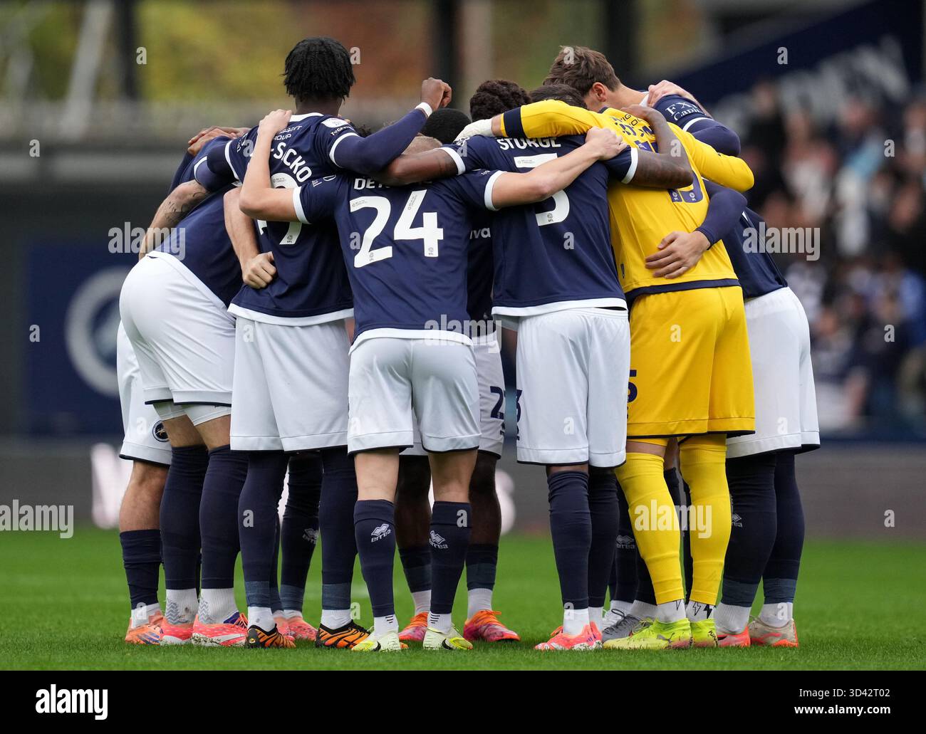 Millwall players in a group huddle before the Sky Bet Championship ...