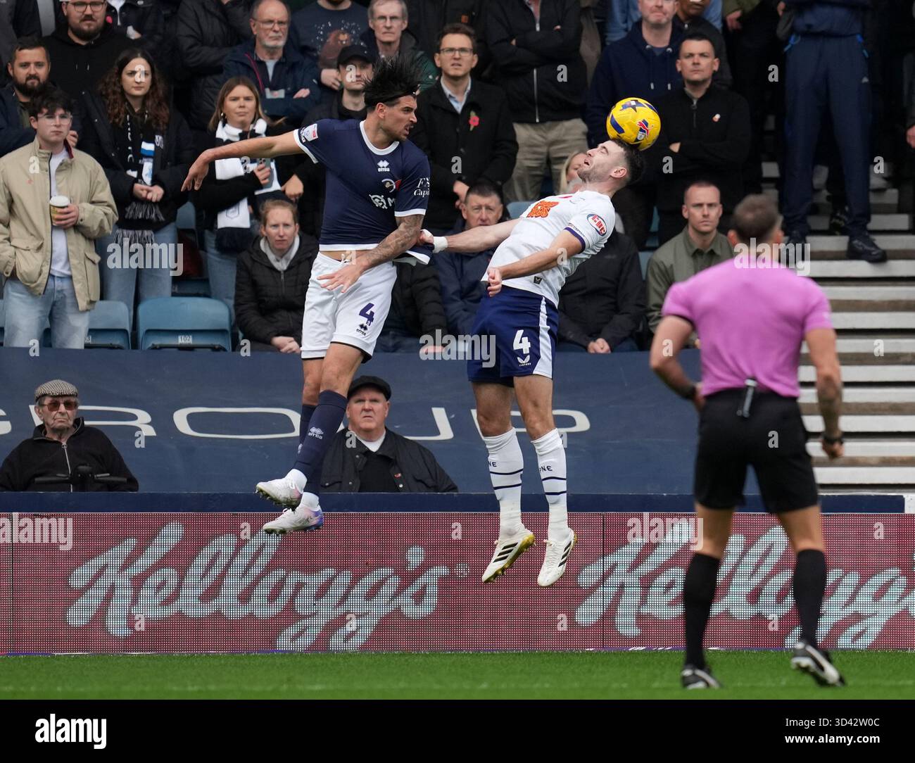 Millwall's Tristan Crama (left) and Preston North End's Ben Whiteman ...