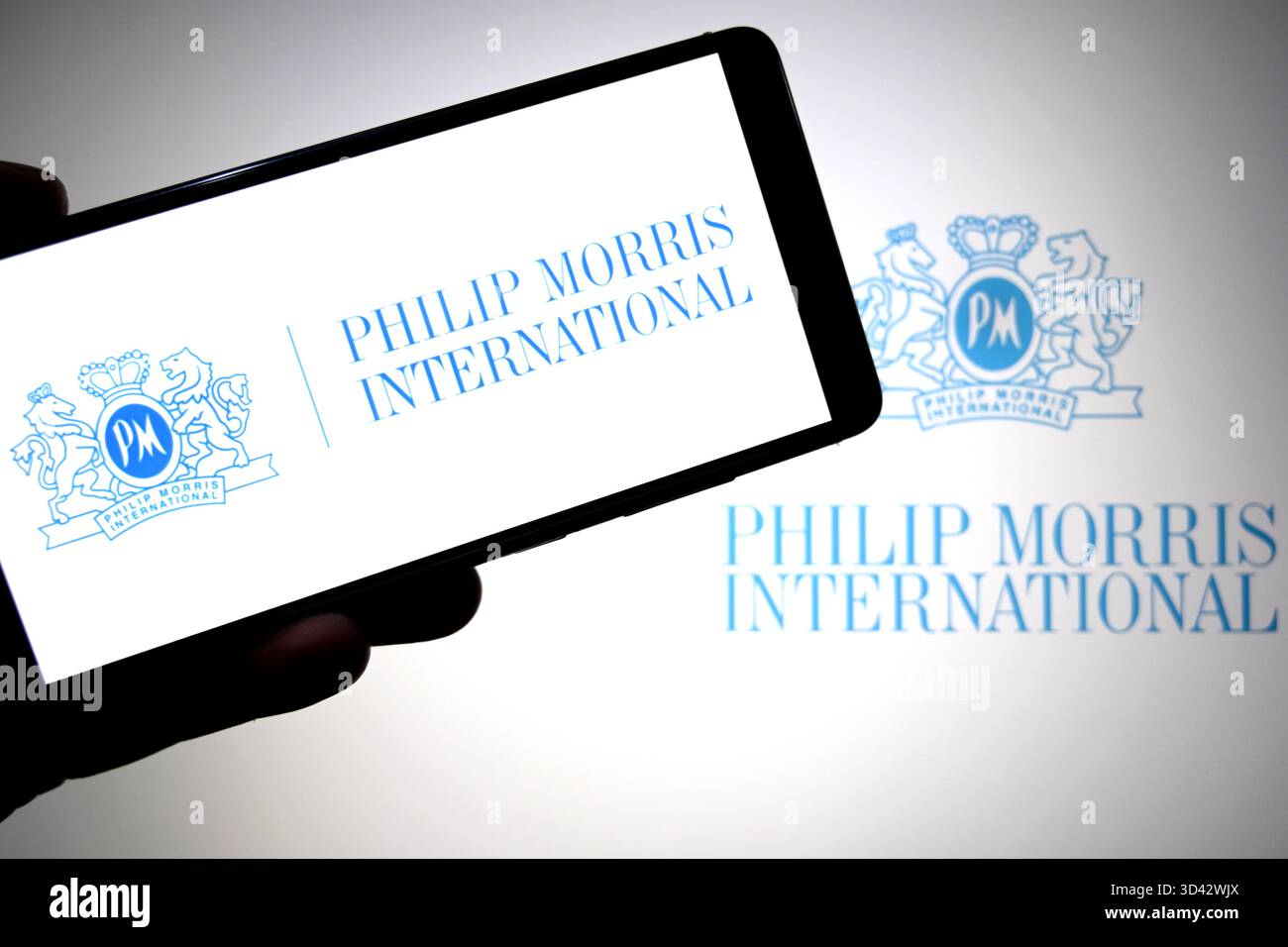 In this photo illustration, a Philip Morris International logo is seen ...