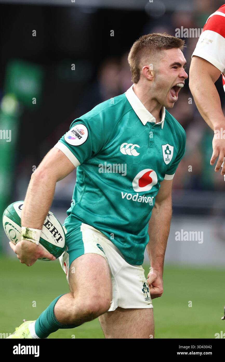 Ireland's Jack Crowley reacts after scoring a try during the rugby ...