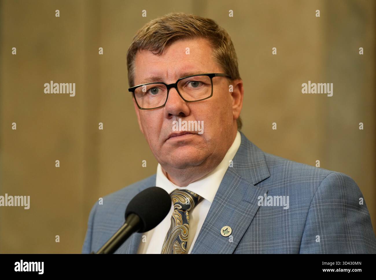Saskatchewan Premier Scott Moe speaks with media after a meeting with ...