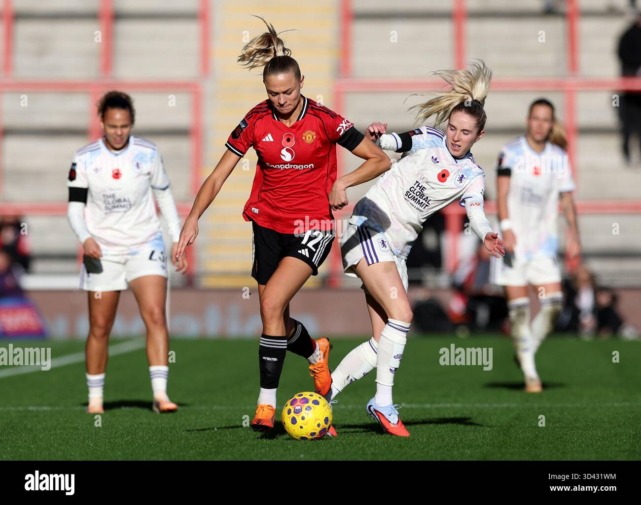 Manchester United's Fridolina Rolfo (left) and Aston Villa's Missy Bo ...