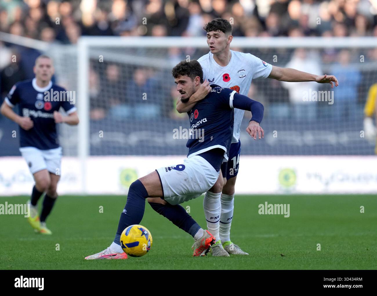 Millwall's Mihailo Ivanovic (left) and Preston North End's Jordan ...