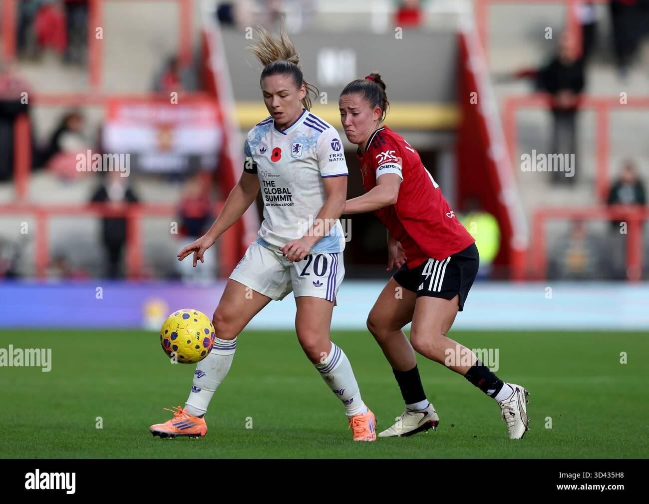 Aston Villa's Kirsty Hanson (left) and Manchester United's Maya Le ...