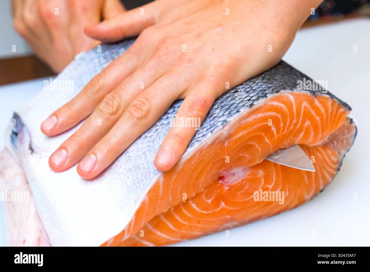 Butchering salmon piece red fish hi-res stock photography and images ...