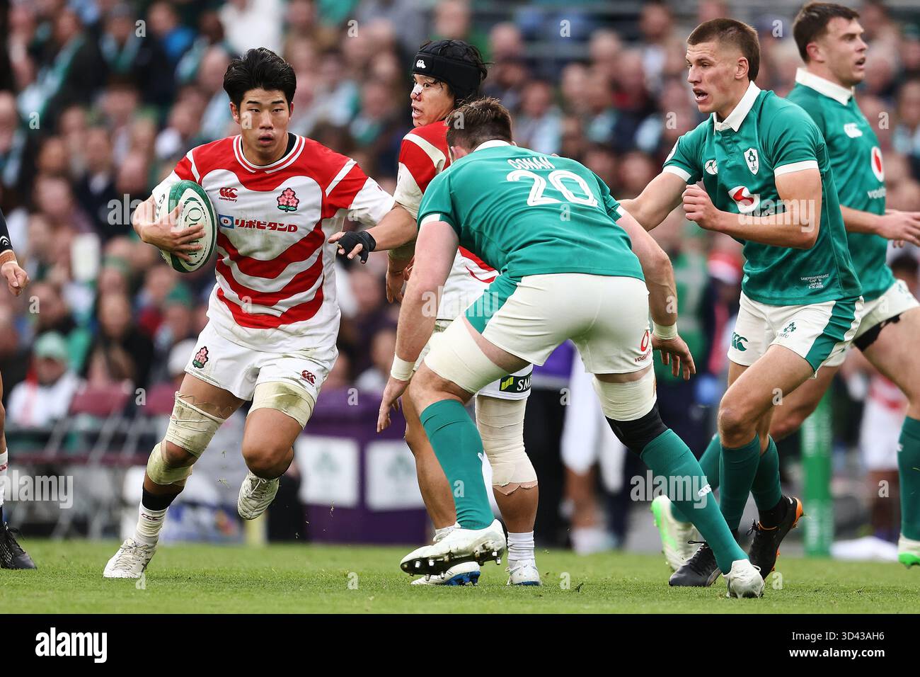 Japan's Yoshitaka Yazaki runs the ball during the rugby union Nations ...