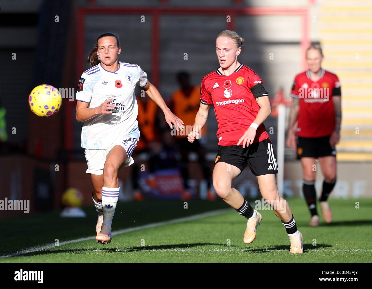 Aston Villa's Sarah Mayling (left) and Manchester United's Anna ...
