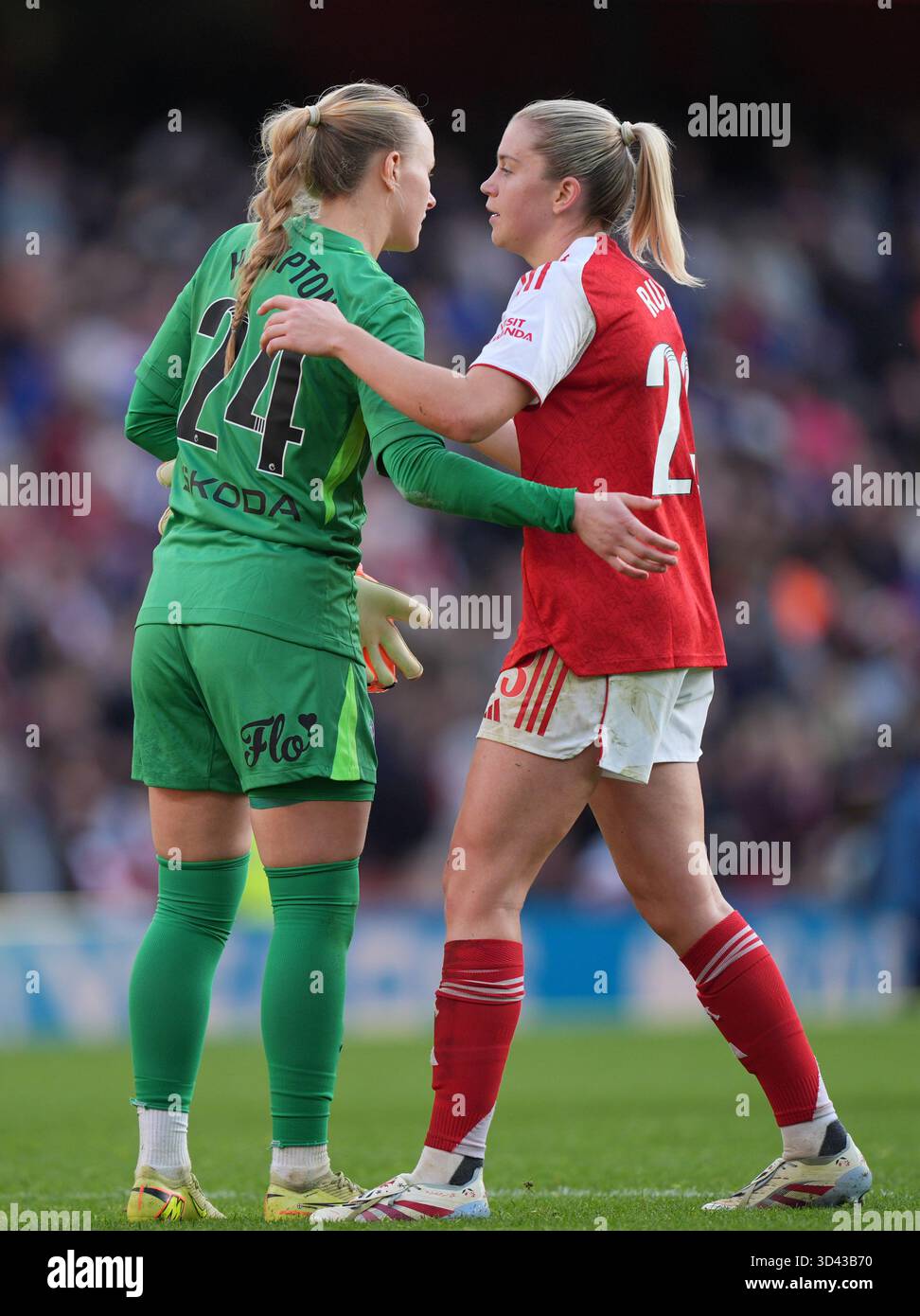 Chelsea goalkeeper Hannah Hampton embraces Arsenal's Alessia Russo ...