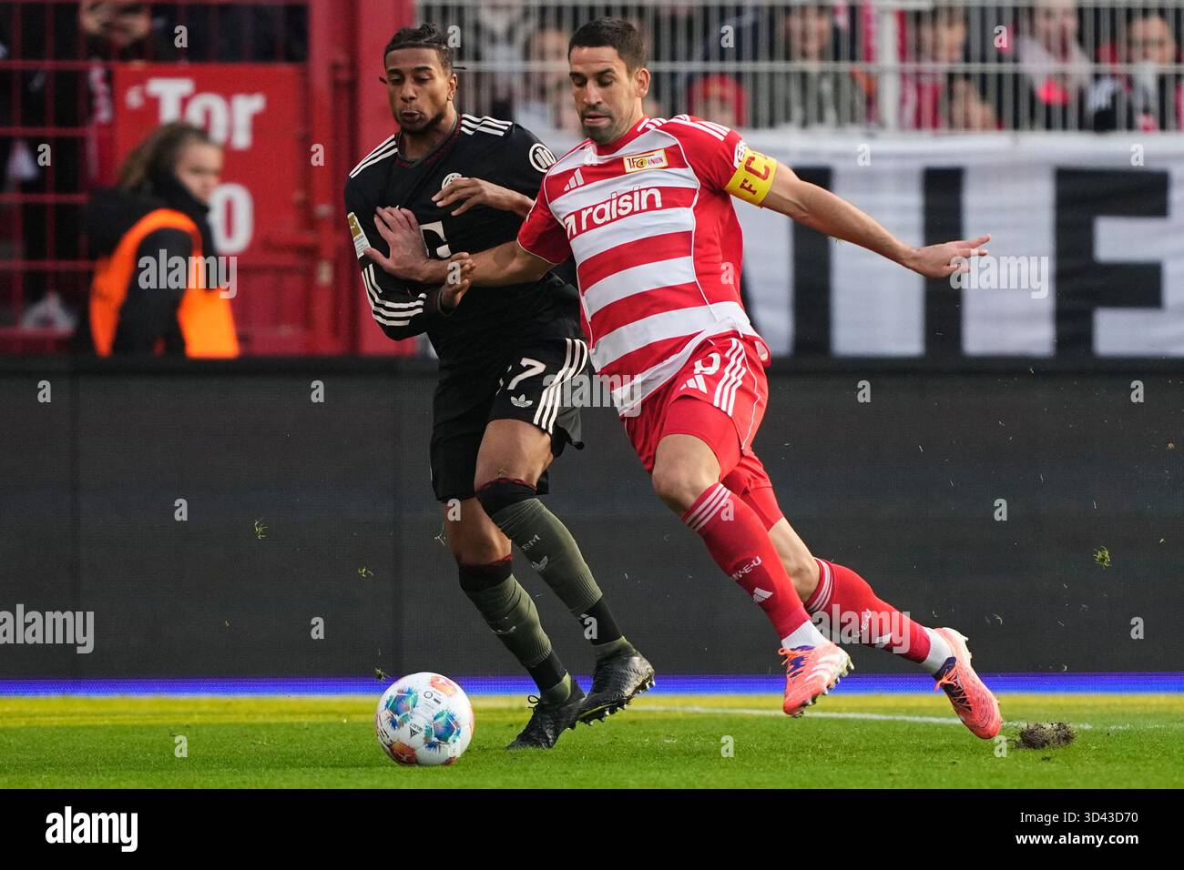 Bayern's Michael Olise, left, and Union's Rani Khedira challenge for ...