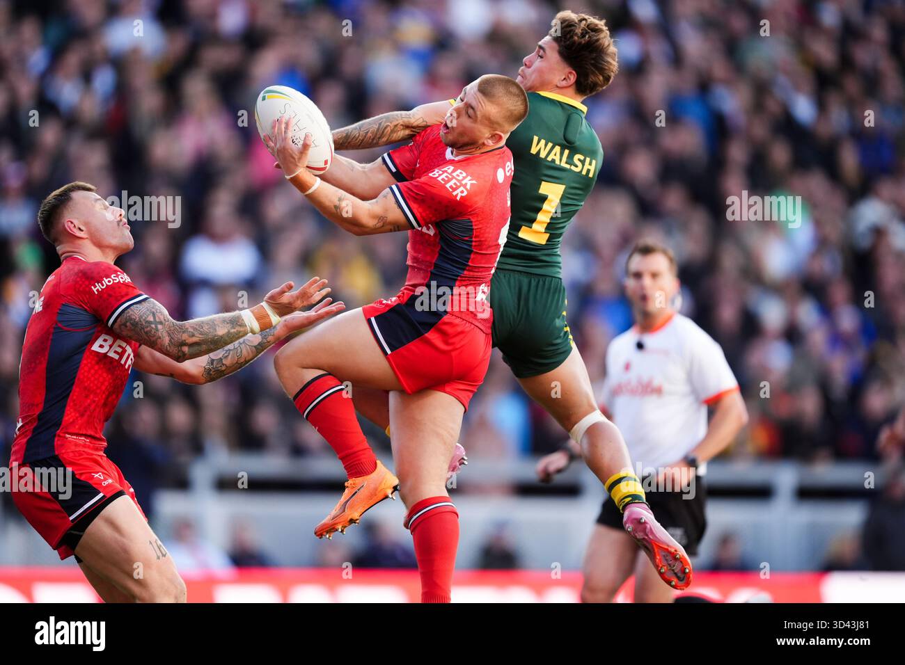 England's Tom Johnstone (left) and Mikey Lewis combine to tackle ...