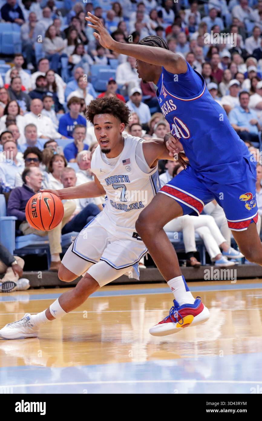 North Carolina guard Seth Trimble (7) drives against Kansas forward ...
