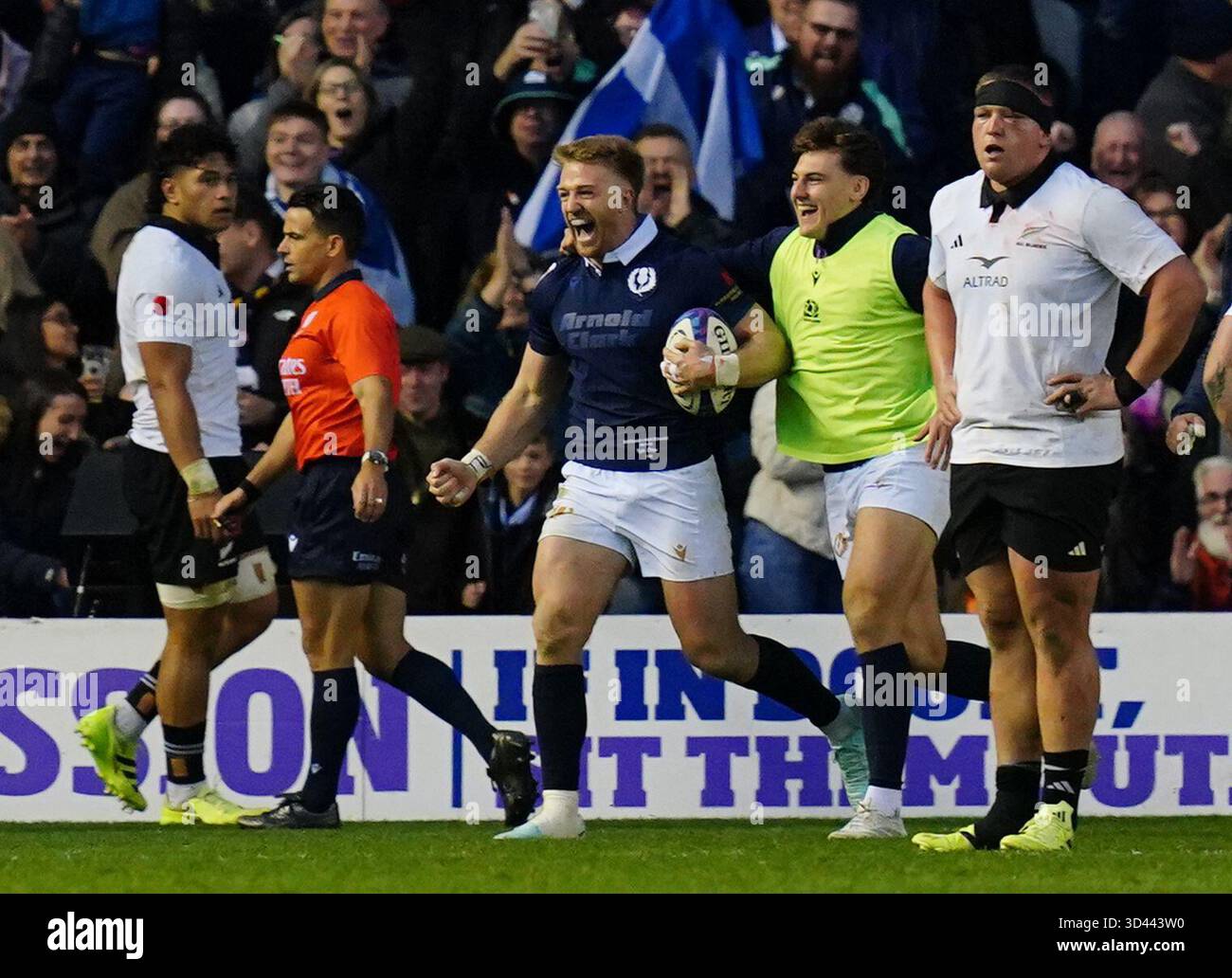 Scotland's Kyle Steyn (centre) celebrates scoring their second try ...
