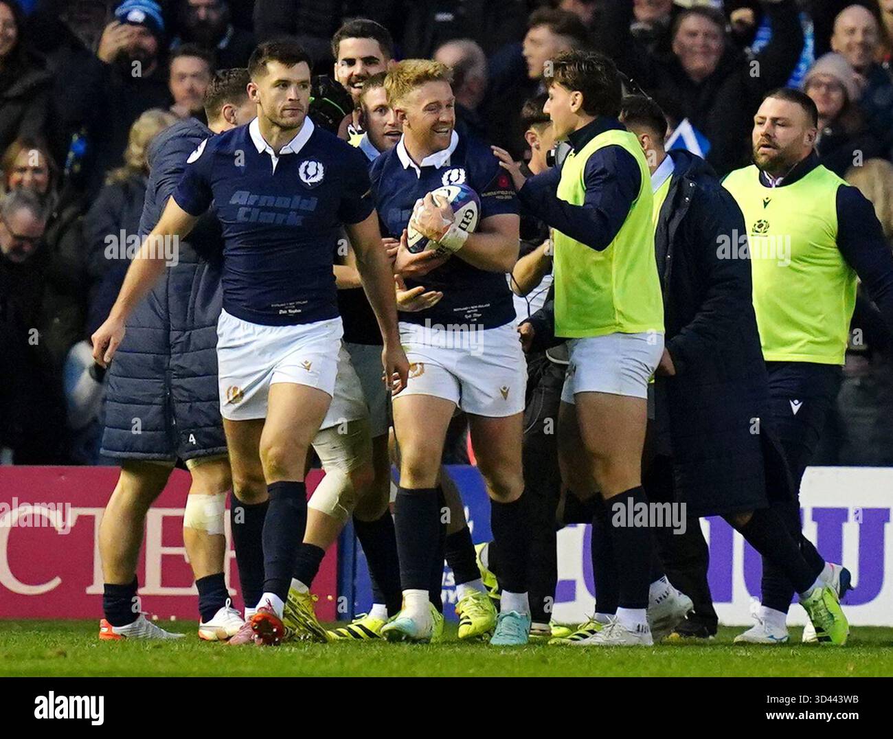 Scotland's Kyle Steyn (centre) celebrates scoring their second try ...