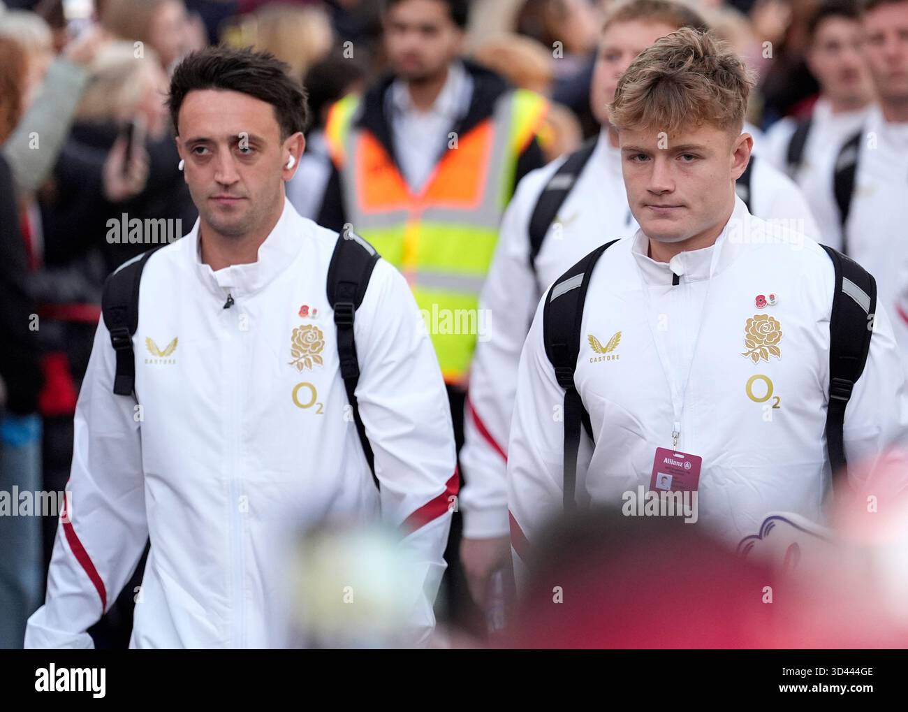 England's Alex Mitchell (left) and Fin Smith arrive with their team ...