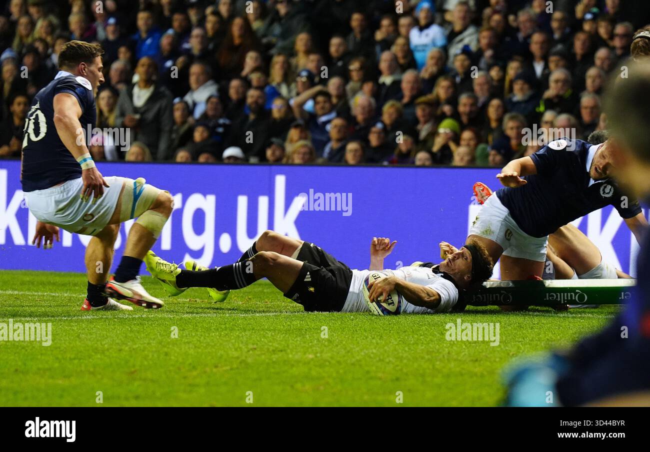New Zealand's Damian McKenzie scores their side's third try during the ...
