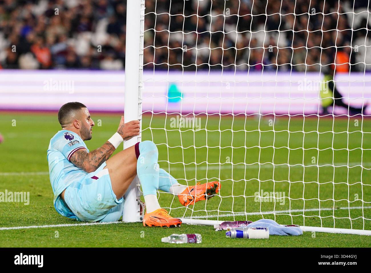 Kyle Walker of Burnley clashes into goalpost during the Premier League ...