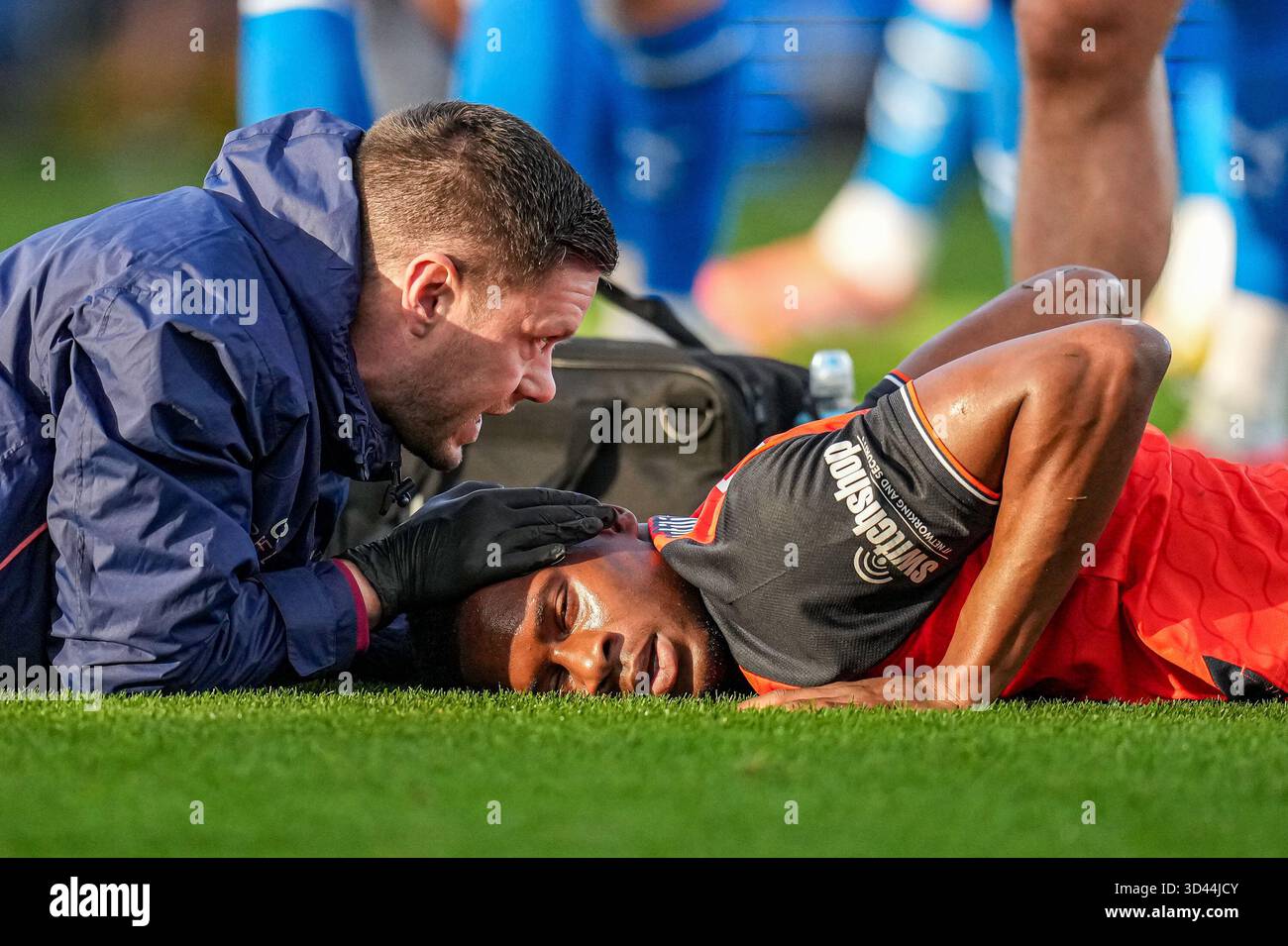 Chris Phillips (Physiotherapist) of Luton Town and Lamine Fanne (22) of ...