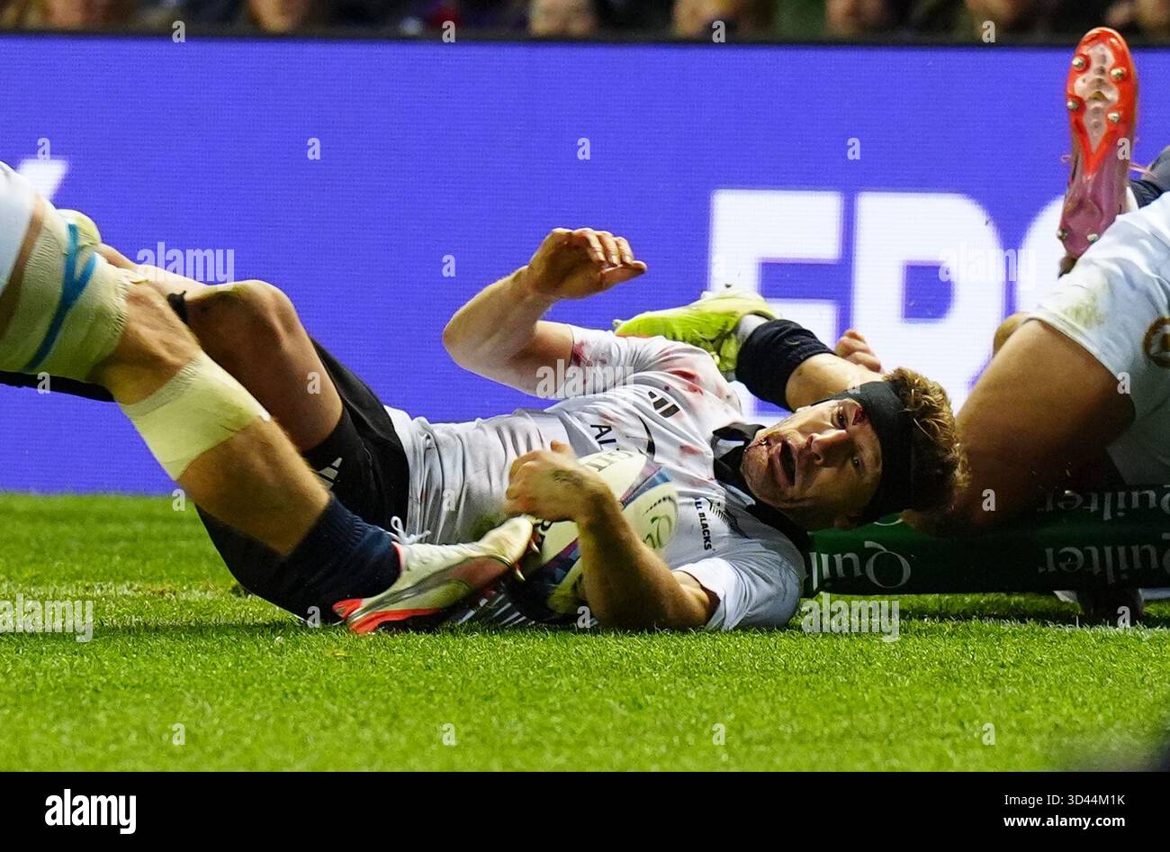 New Zealand's Damian McKenzie scores their side's third try during the ...