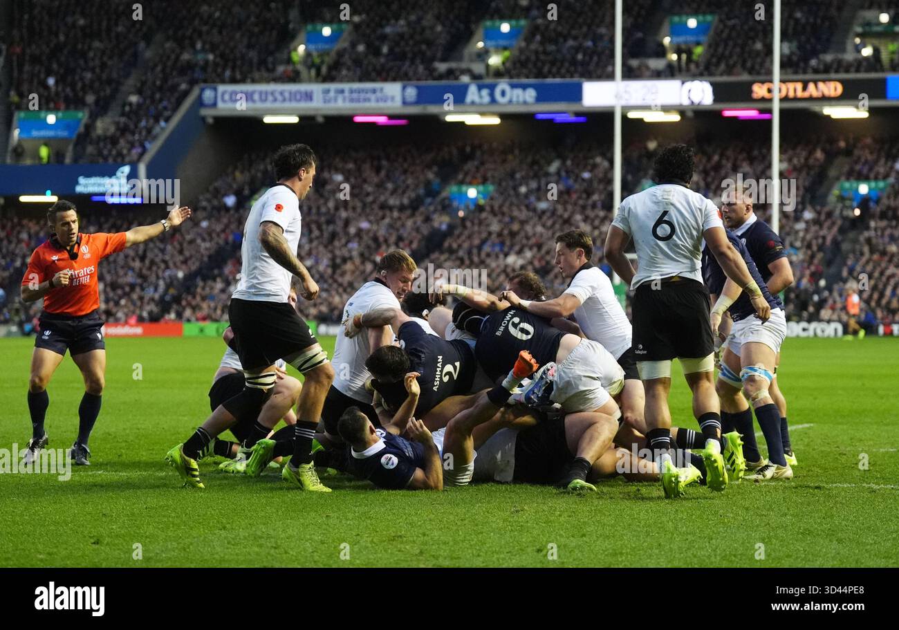 Scotland's Ewan Ashman scores their side's first try during the Quilter ...