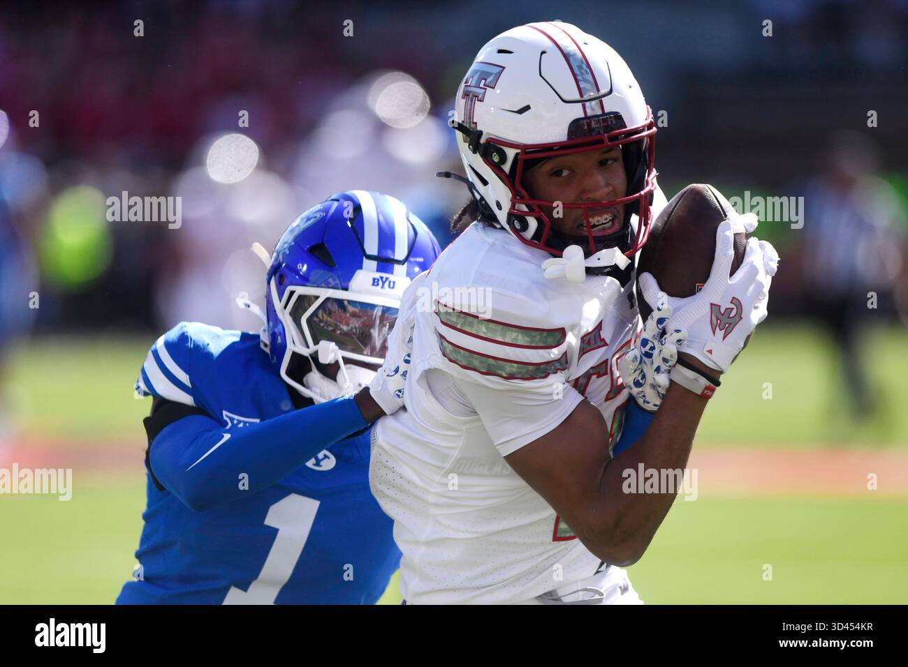 Texas Tech wide receiver Reggie Virgil (1) catches a pass ahead of BYU ...