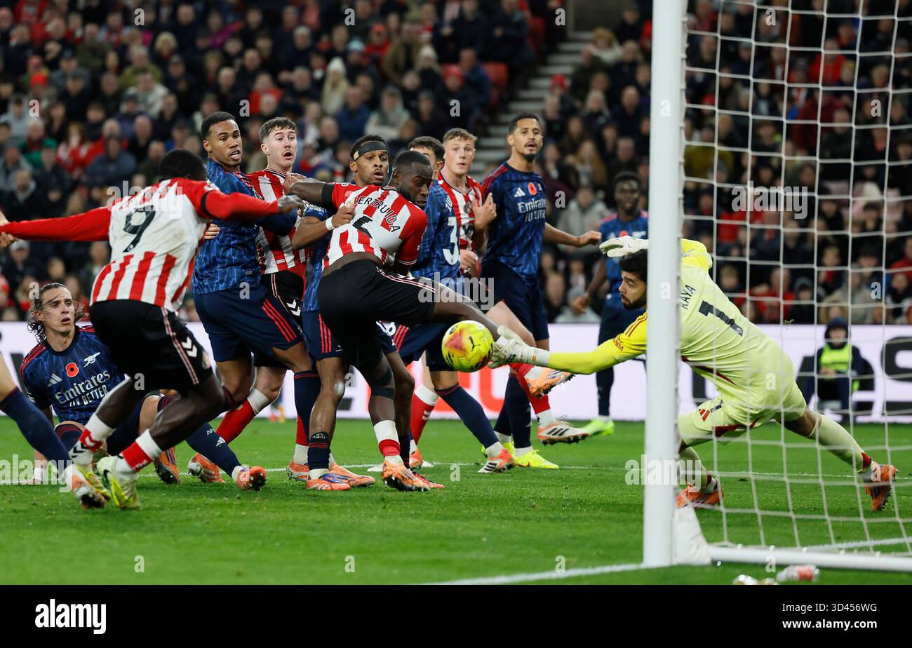 Arsenal goalkeeper David Raya makes a save during the Premier League ...