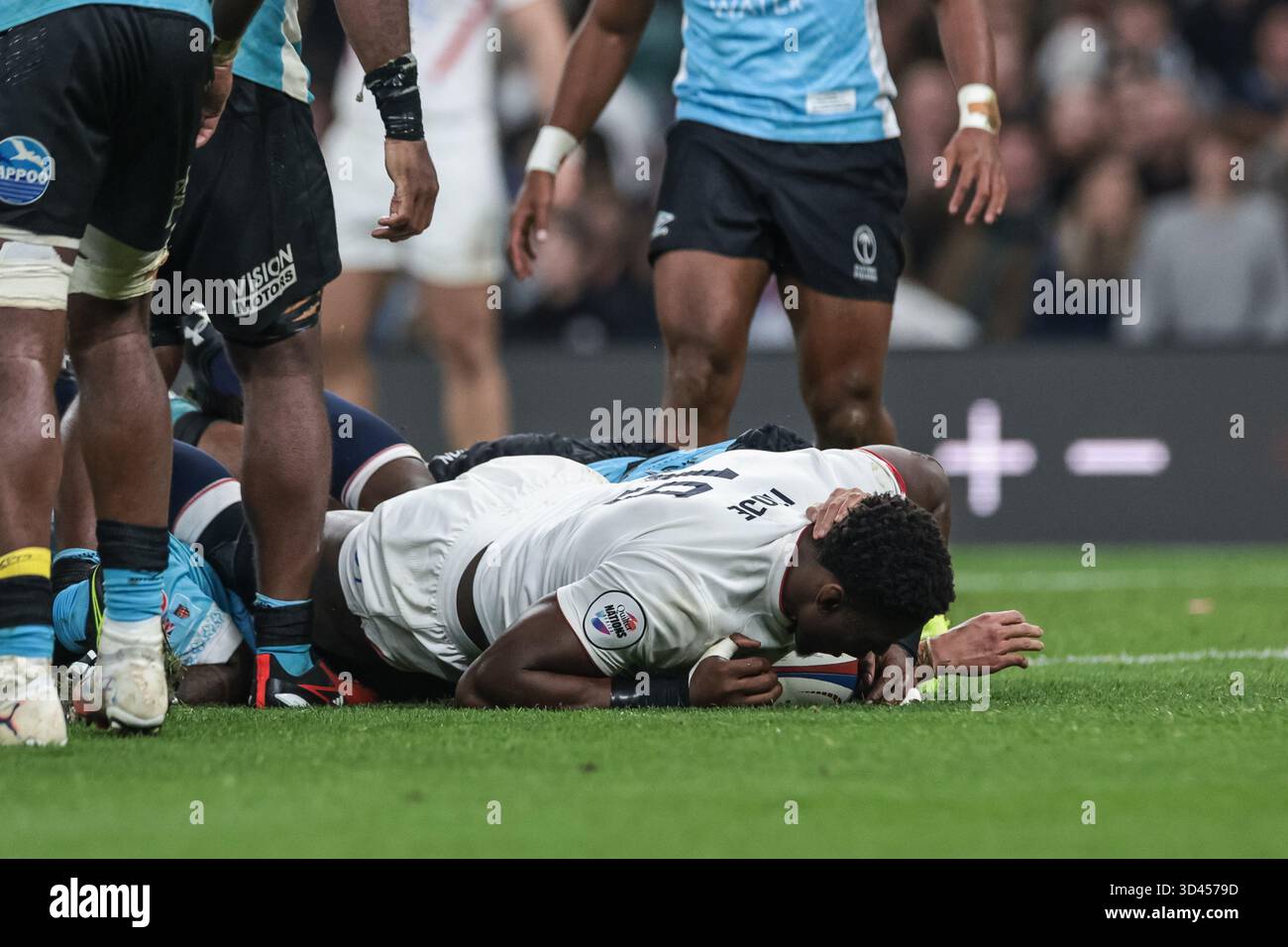 Mario Itoje of England goes over for a try during the Quilter Nations ...
