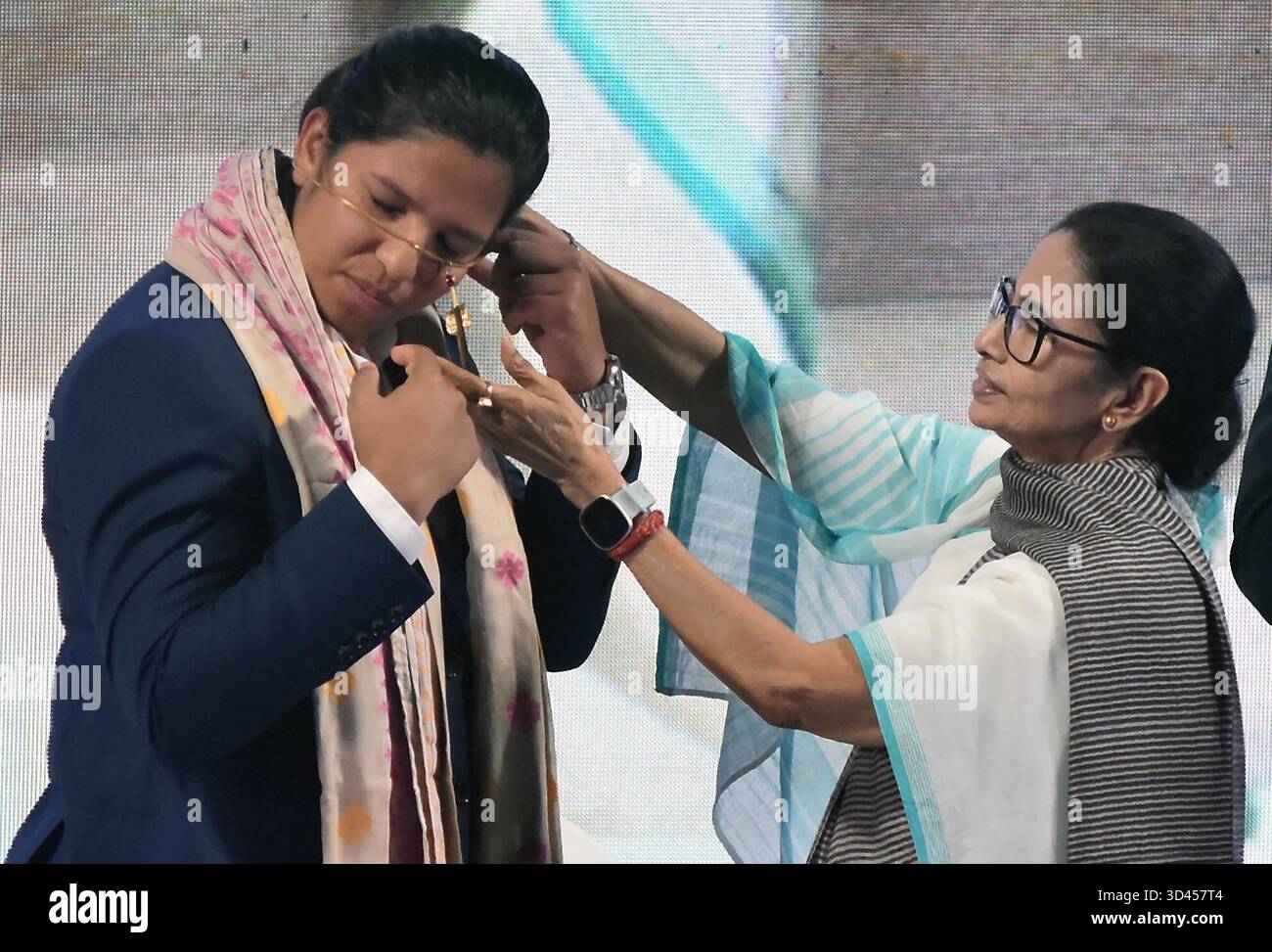 West Bengal Chief Minister Mamata Banerjee with Richa Ghosh, member of ...