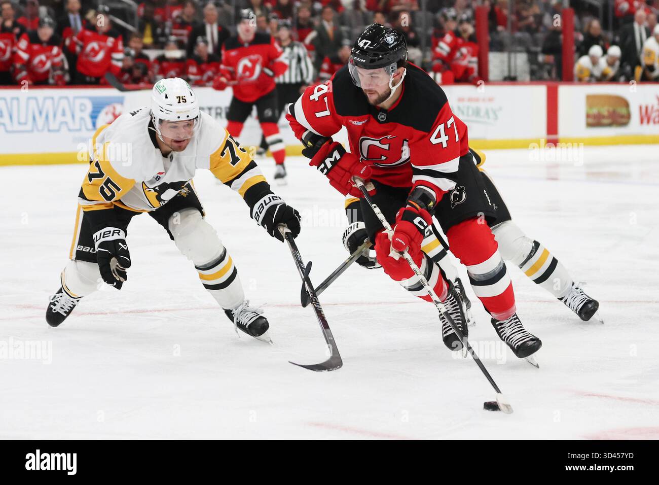 Pittsburgh Penguins defenseman Connor Clifton (75) defends against New ...