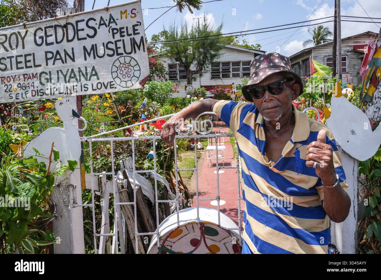 Legendary steel pan musician Roy Geddes, poses outside of the Roy ...