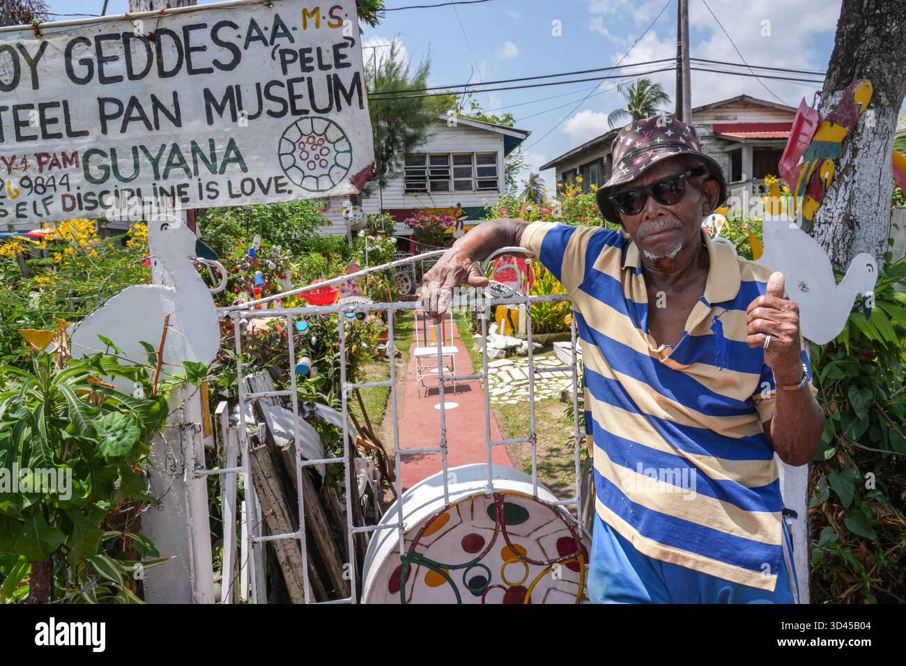 Legendary steel pan musician Roy Geddes, poses outside of the Roy ...