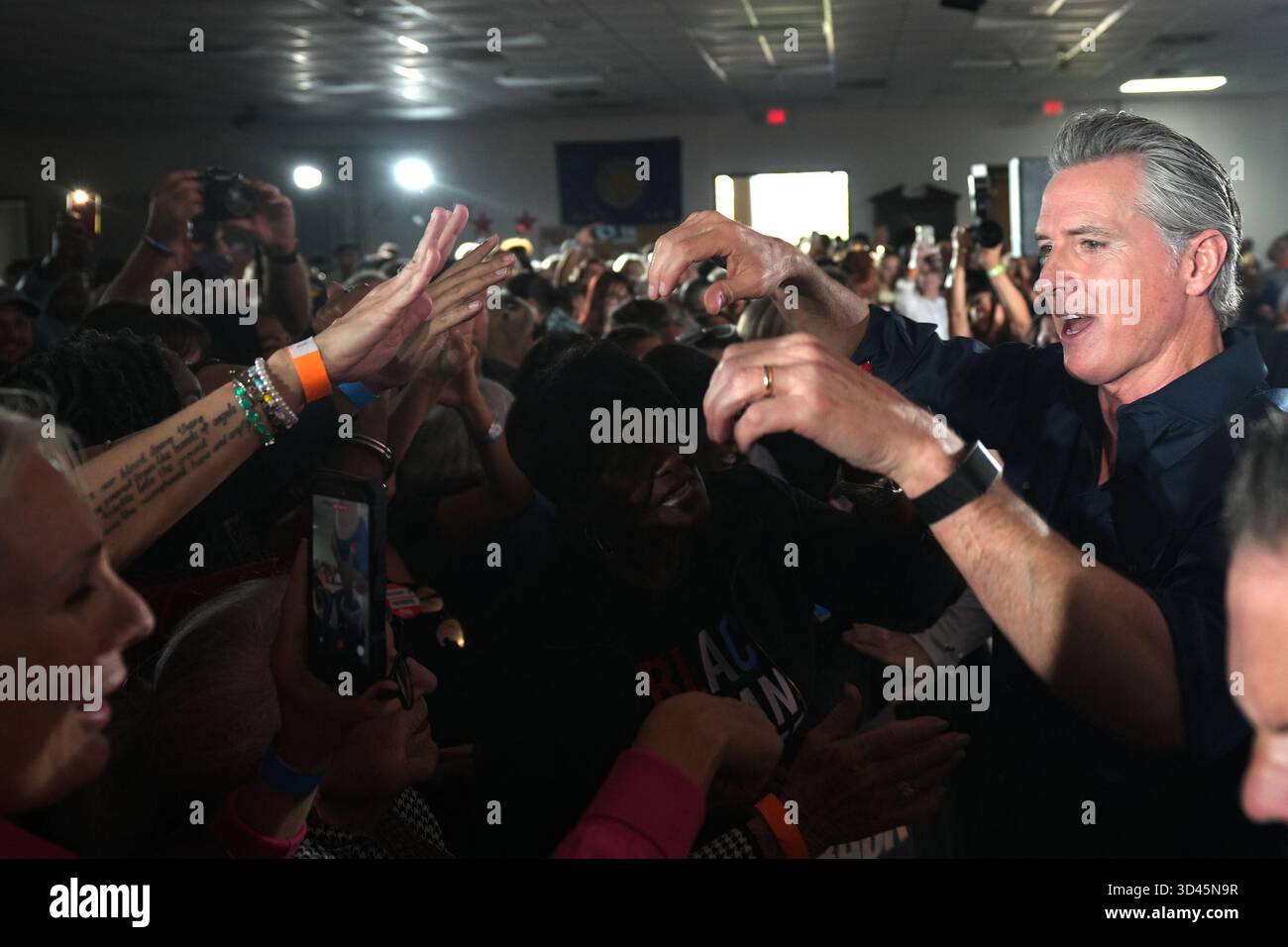 California Gov. Gavin Newsom greets supporters after a rally with ...