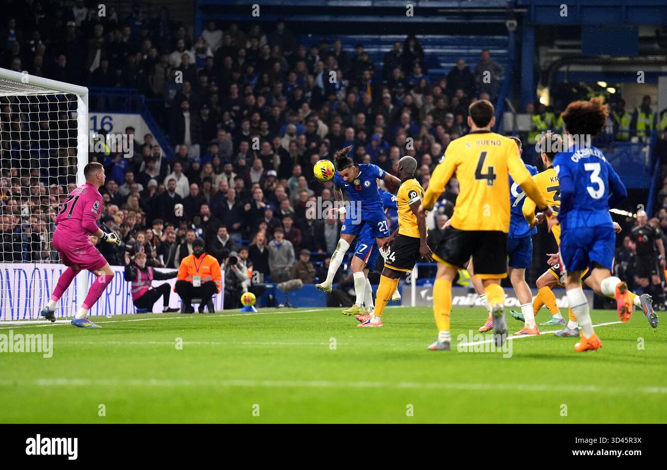 Chelsea's Malo Gusto (centre) scores their side's first goal of the ...