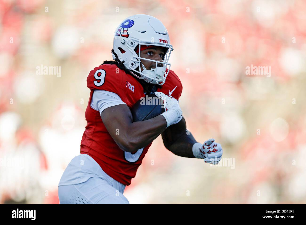 Rutgers wide receiver Ian Strong (9) scores his first touchdown of the ...