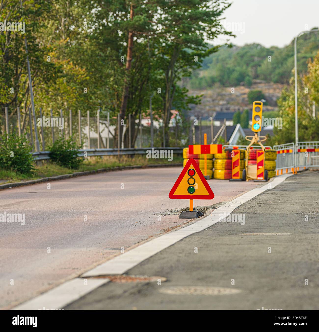 Temporary traffic light signal and road construction warning sign Stock ...