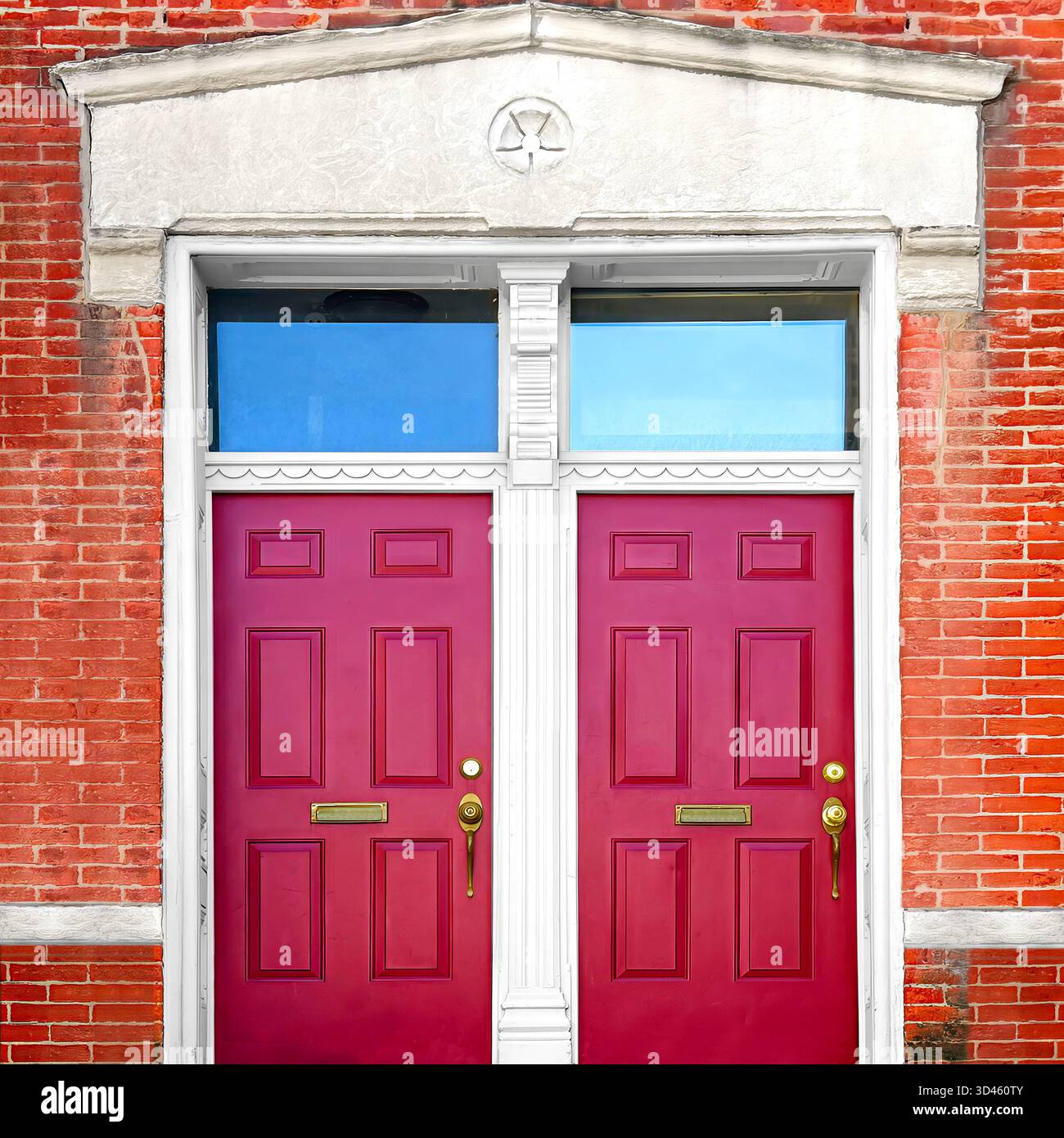 Red double doors with white trim and blue transom glass, blending ...