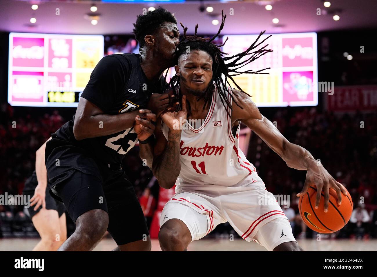 Towson forward Caleb Embeya (23) defends against Houston forward Joseph ...