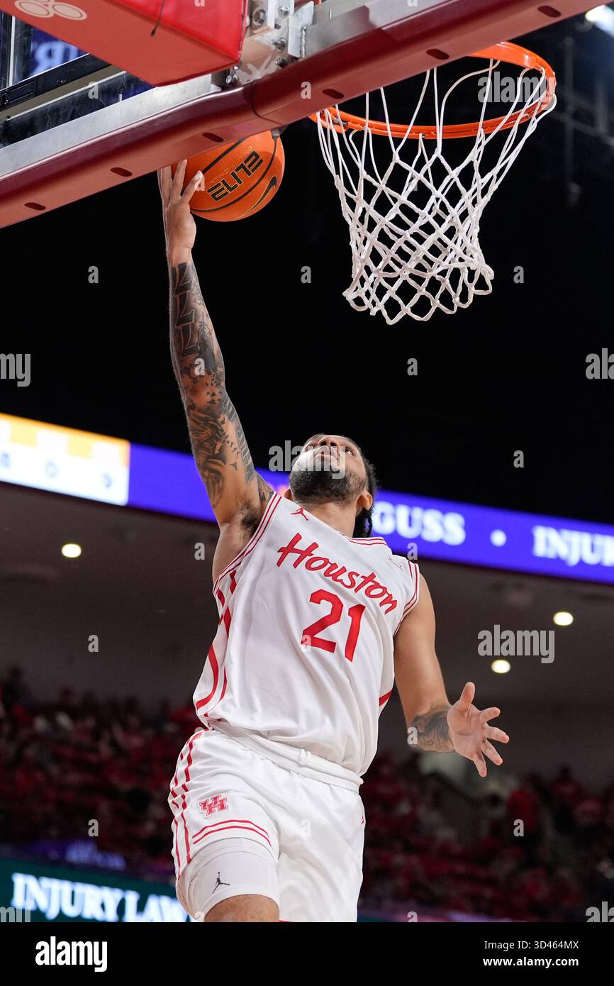 Houston guard Emanuel Sharp (21) shoots during the second half of an ...