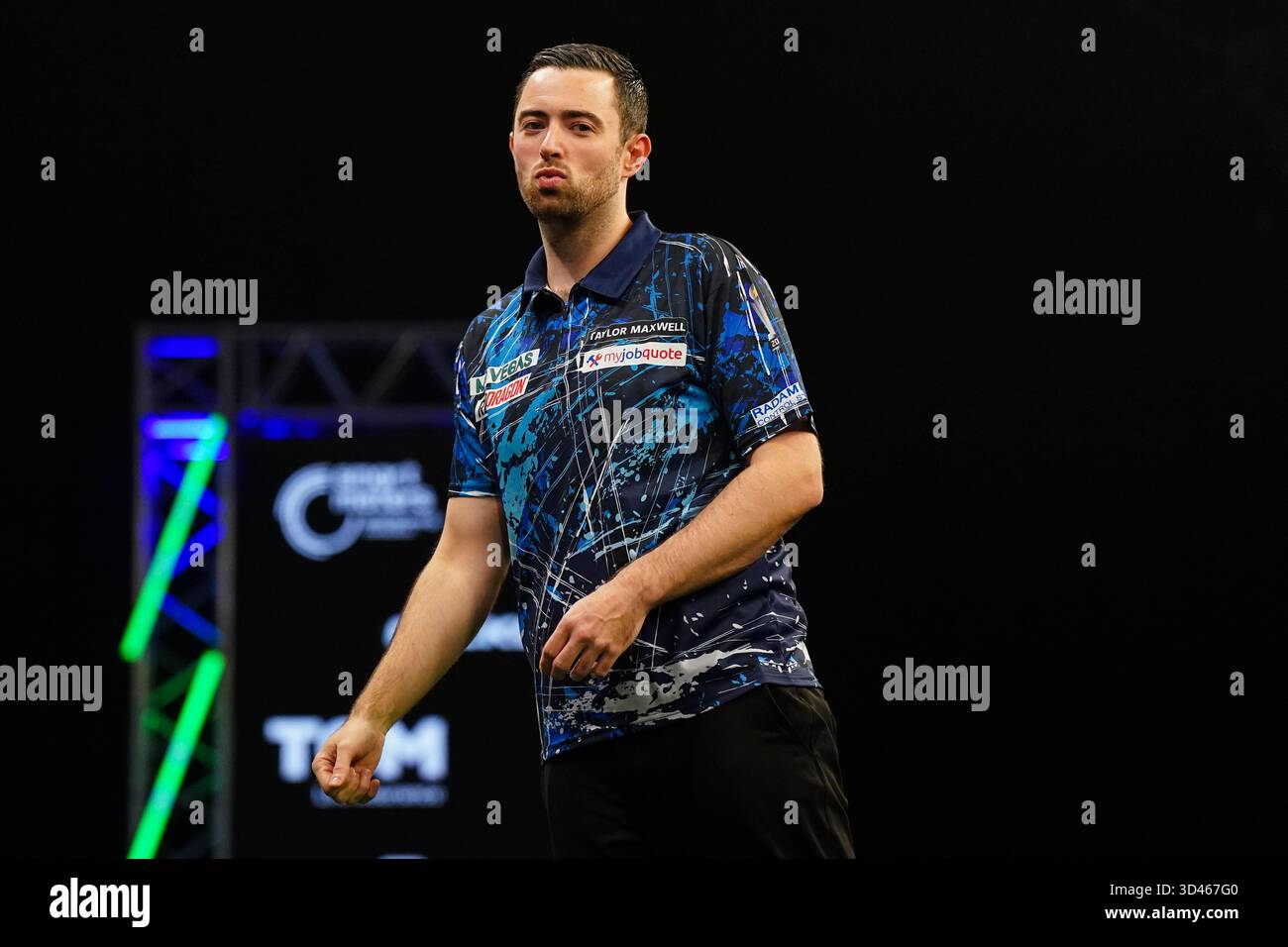Luke Humphries reacts during his match against Alex Spellman at the WV ...